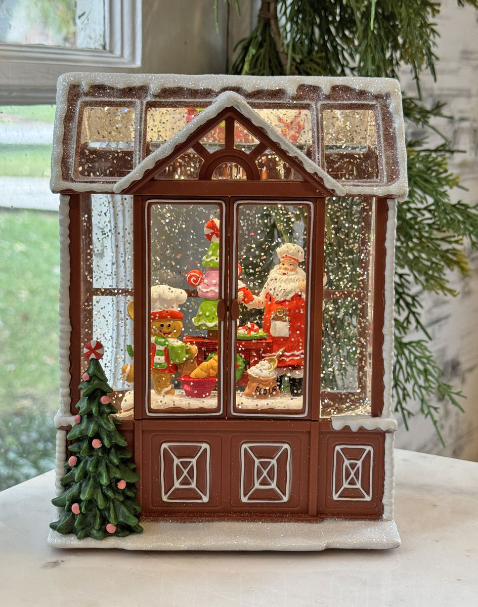 Gingerbread House With Santa And Treats In Swirling Glitter - 2732590 ...